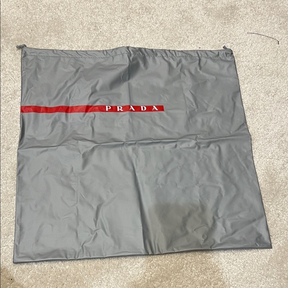 Prada | Accessories | Prada Gray Bag With Red Accent | Poshmark